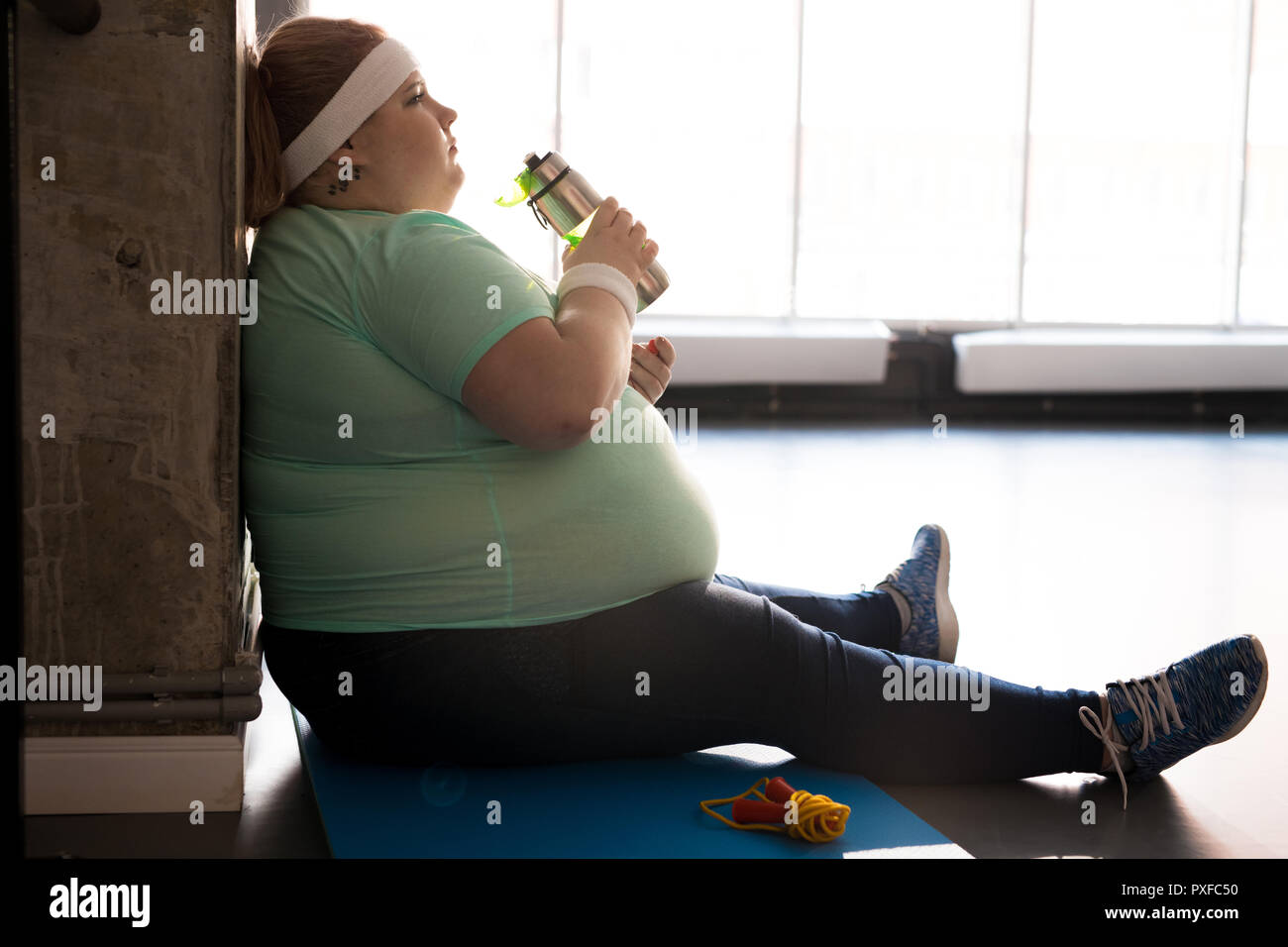 Obese overweight sitting woman hi-res stock photography and images - Alamy