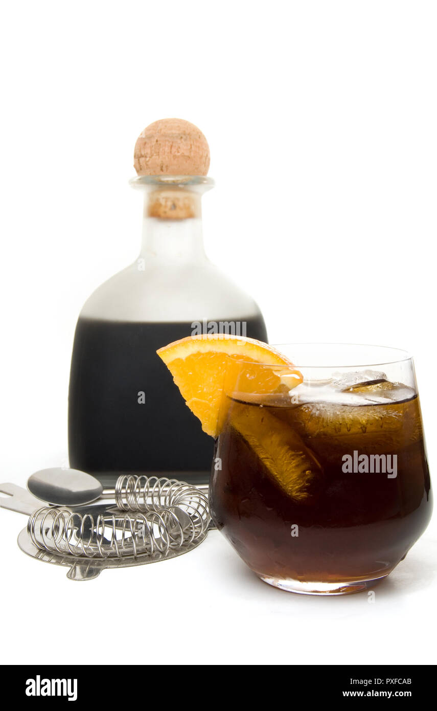 Antique Alcohol Bottle with Glass and Orange Slice Stock Photo - Alamy