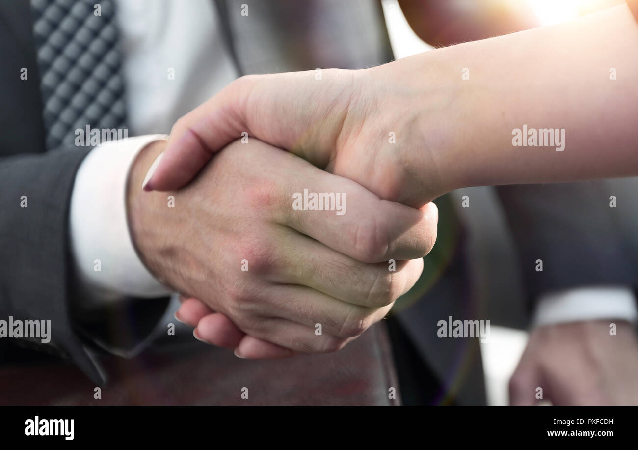 Businessman shaking hands to seal a deal with his partner Stock Photo ...