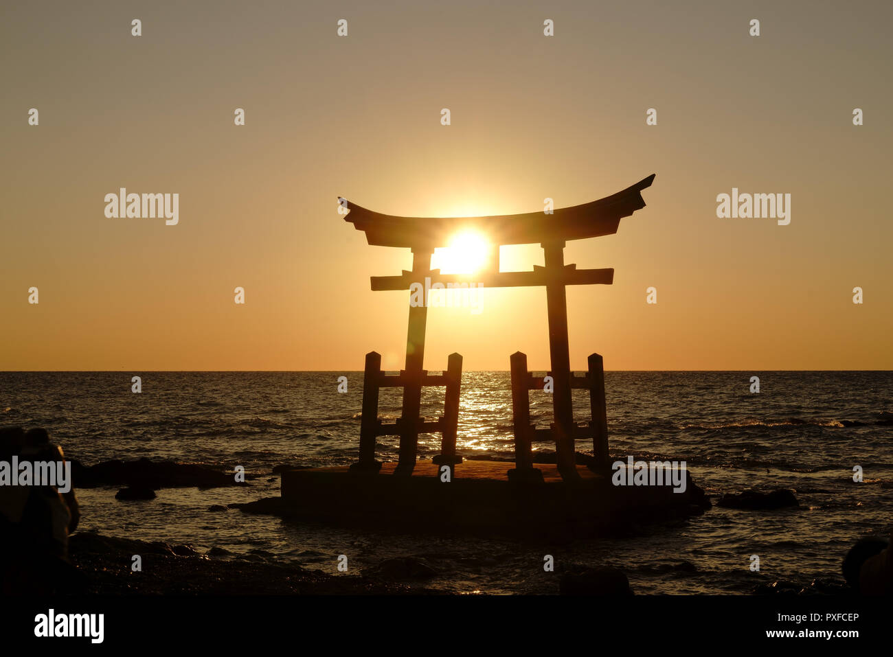 Sunset and Torii (Entrance to Shinto Shrine Stock Photo - Alamy