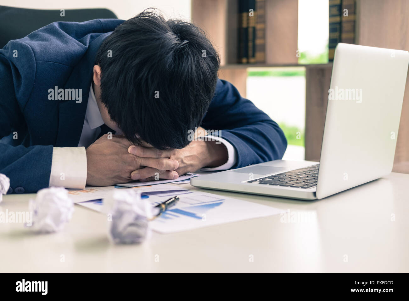 Depressed failure and tired businessman late sad and solving problem in ...