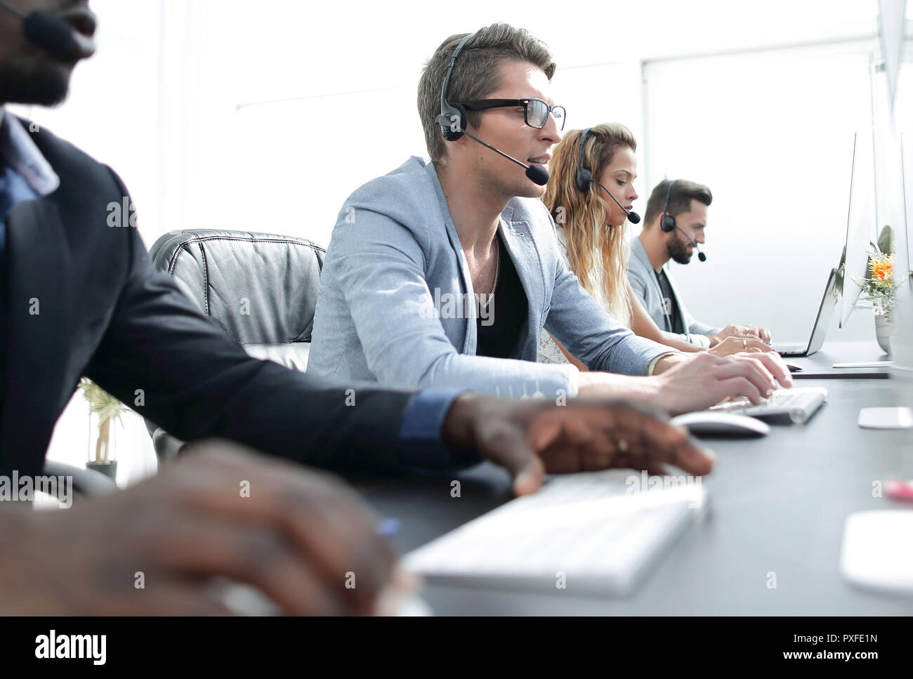 call center staff work in a modern office Stock Photo - Alamy