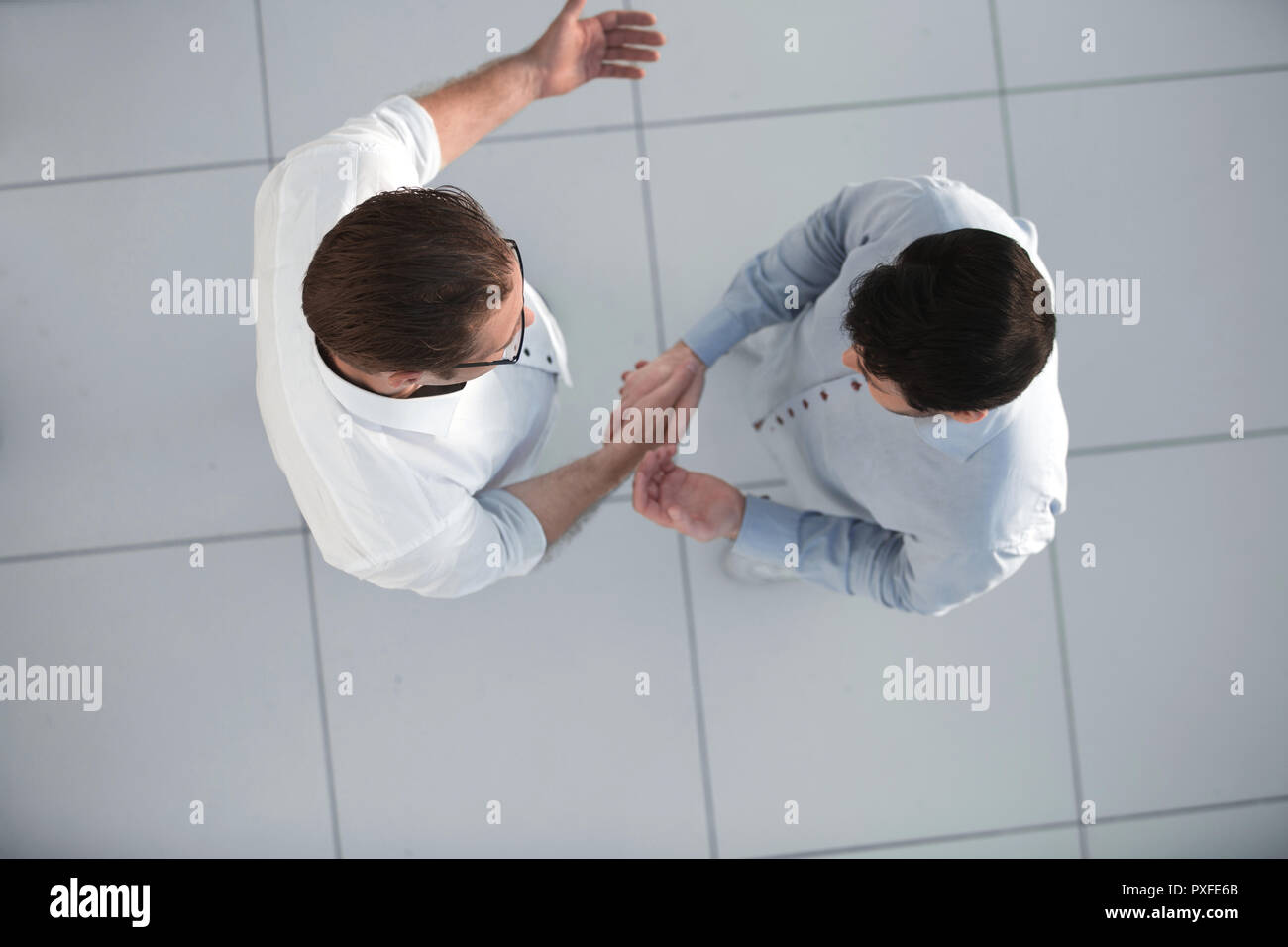top view. handshake of modern business people Stock Photo - Alamy