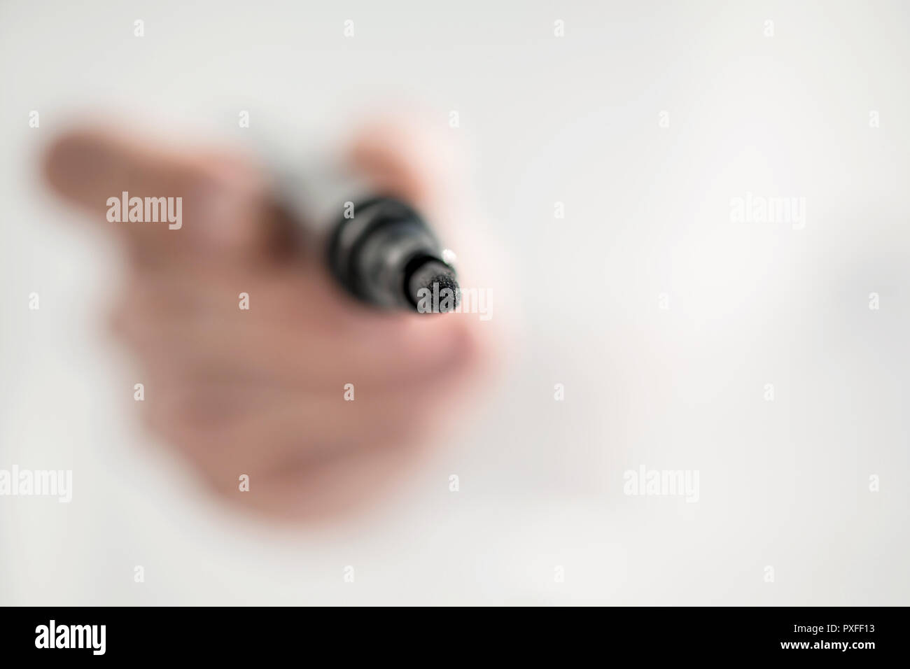 Close up hand holding marker hi-res stock photography and images - Alamy