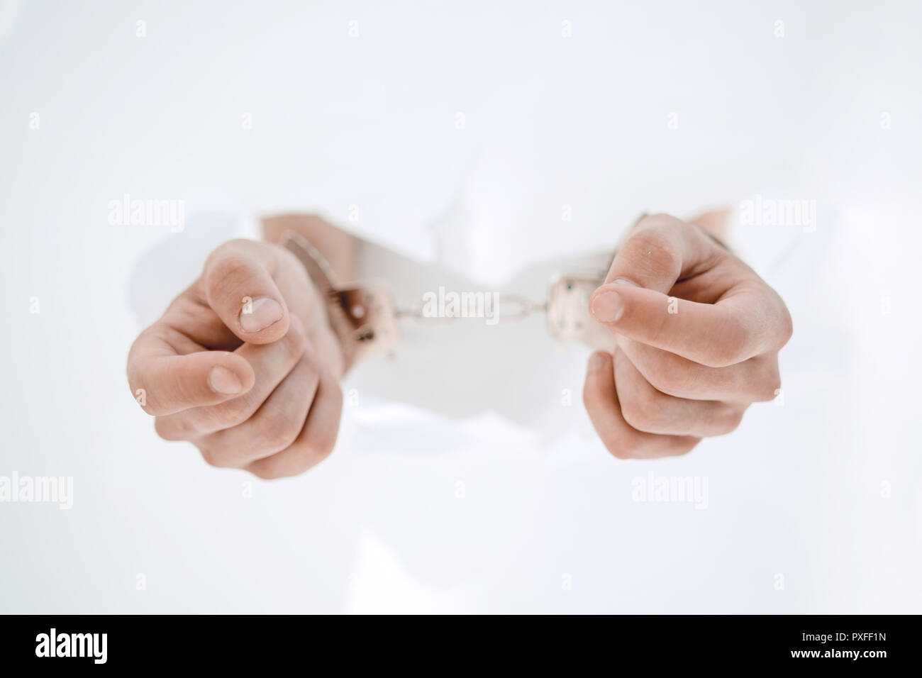 close up.handcuffed hands Stock Photo - Alamy