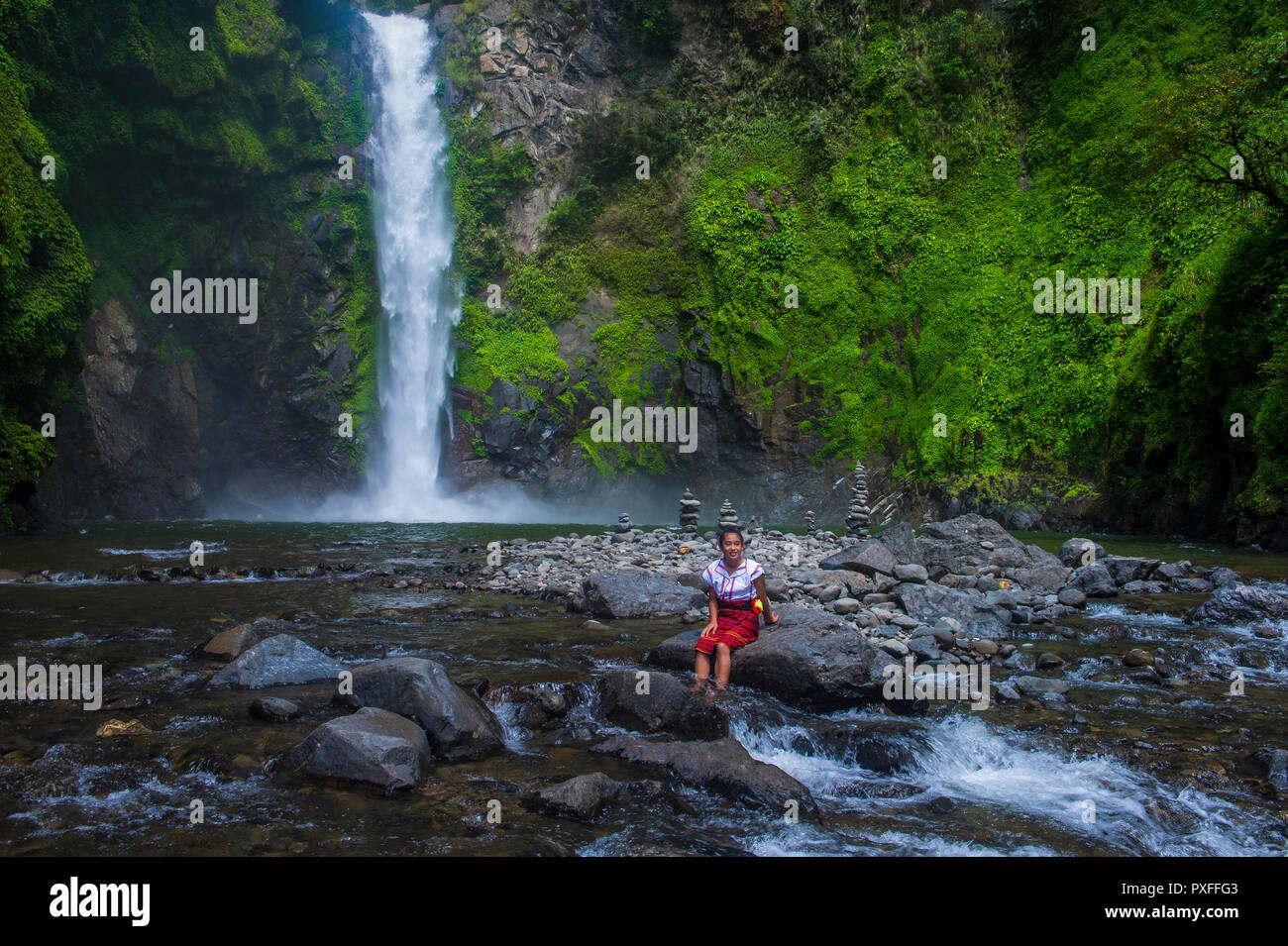 Girl from Ifugao Minority near a waterfall in Batad the Philippines ...