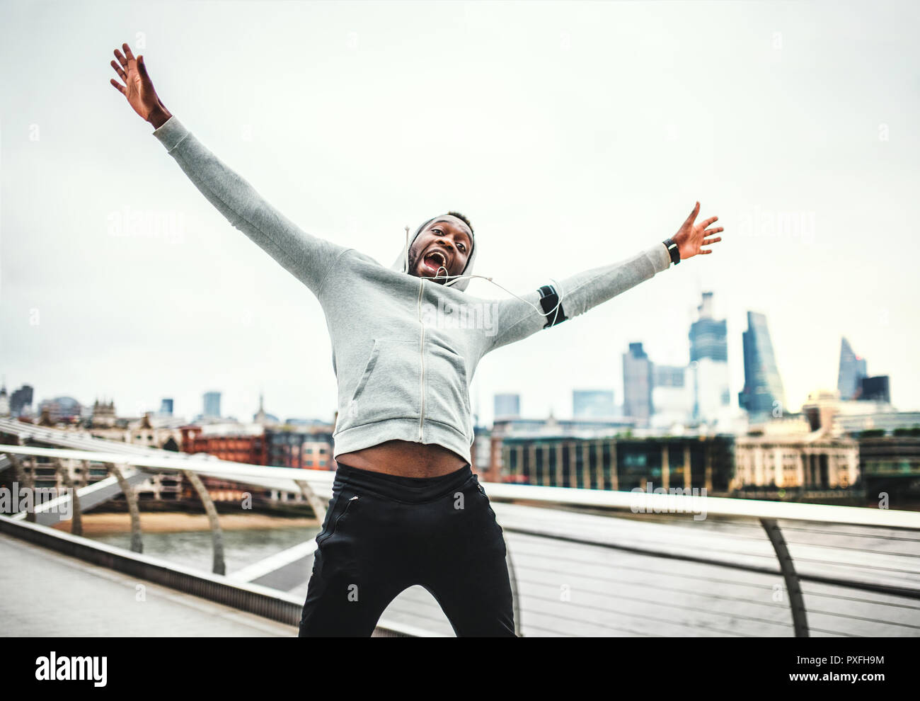 Boy arms out stretched hi-res stock photography and images - Alamy