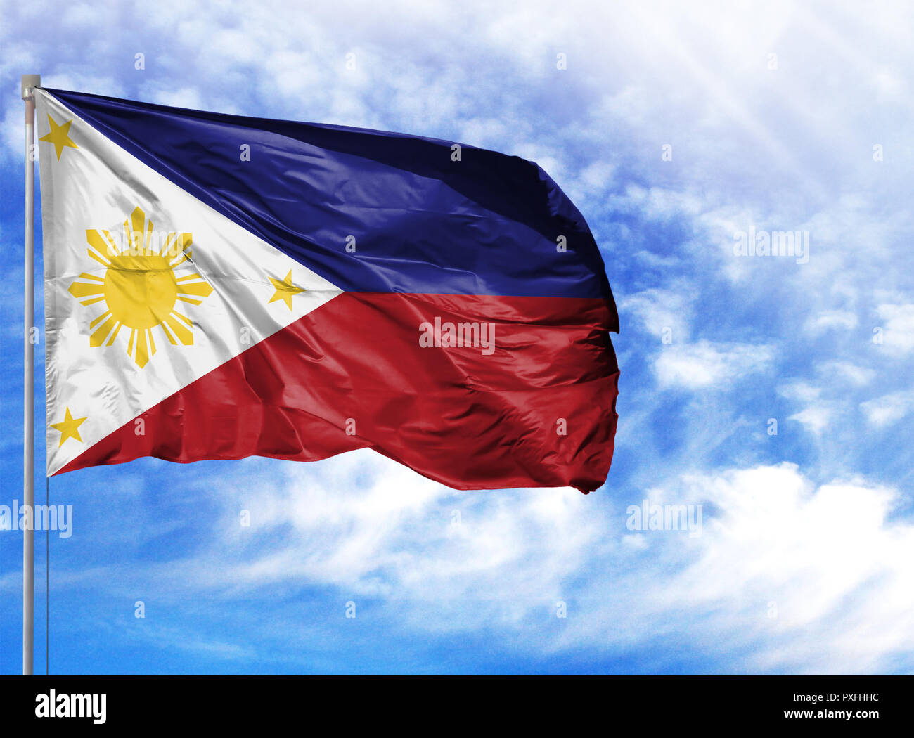 Philippines flag on flag pole hi-res stock photography and images - Alamy