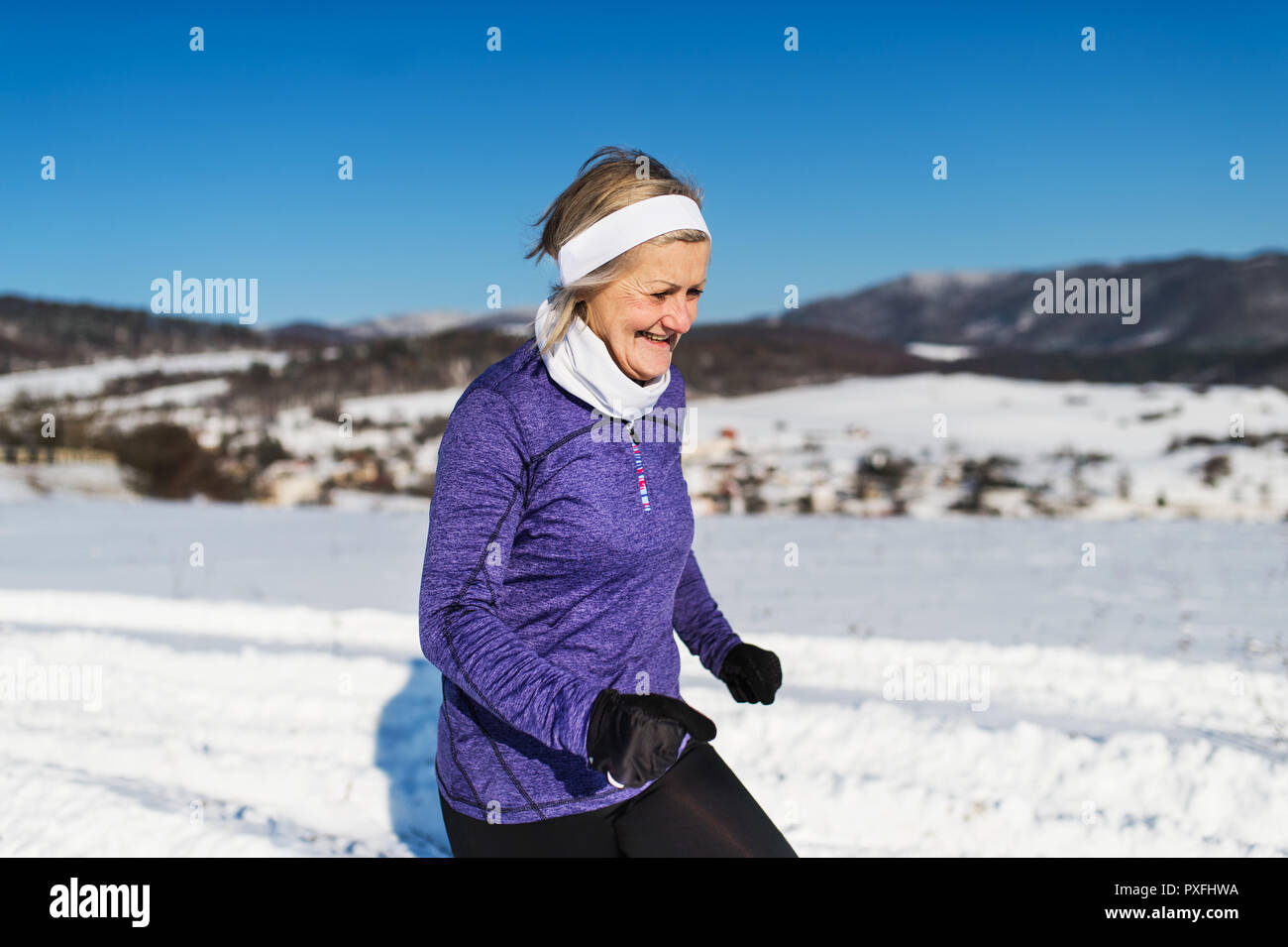 Woman jogging outside hi-res stock photography and images - Alamy