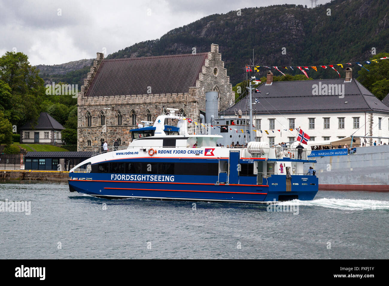 Catamaran Rygertroll departing the port of Bergen, Norway for a fjord ...