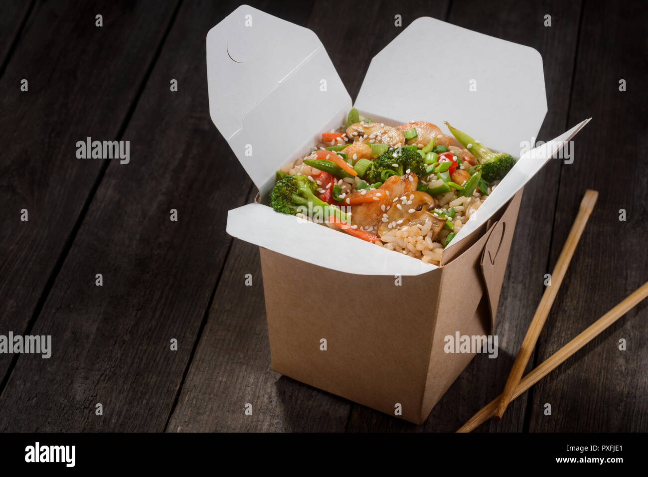 Rice in cardboard box Stock Photo - Alamy