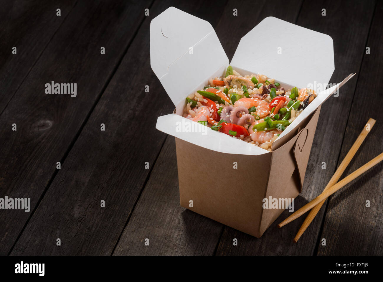Rice in box and chopsticks Stock Photo - Alamy