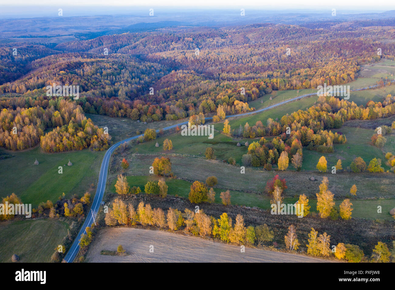 Aerial flight above dirt road hi-res stock photography and images - Alamy