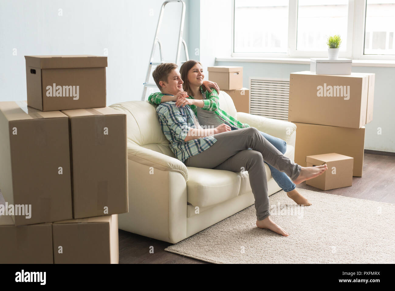 New home, moving and real estate concept - Lovely couple discussing ...