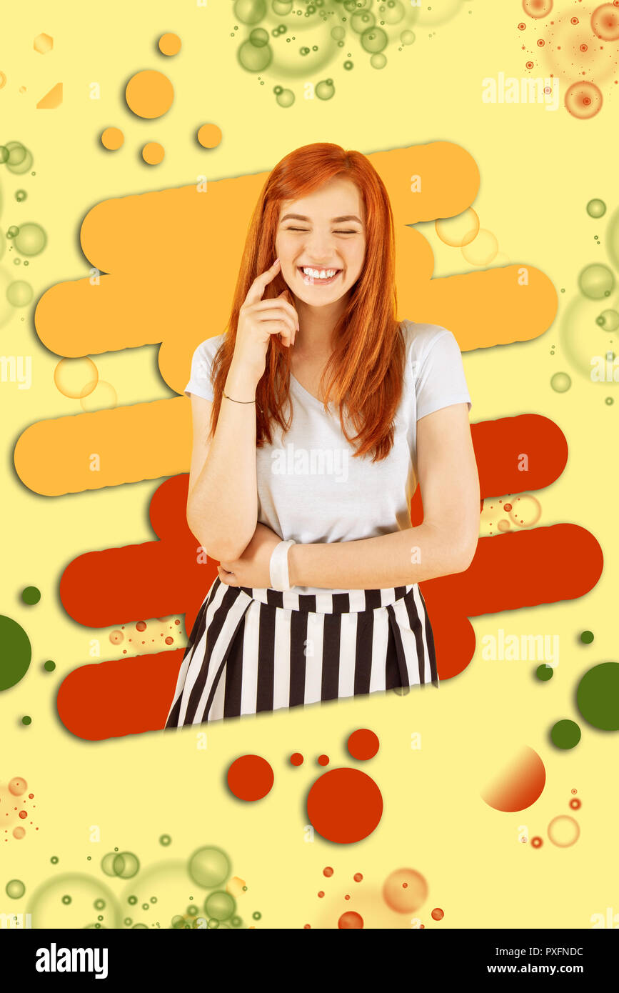 Cheerful positive girl smiling broadly while feeling extremely happy ...