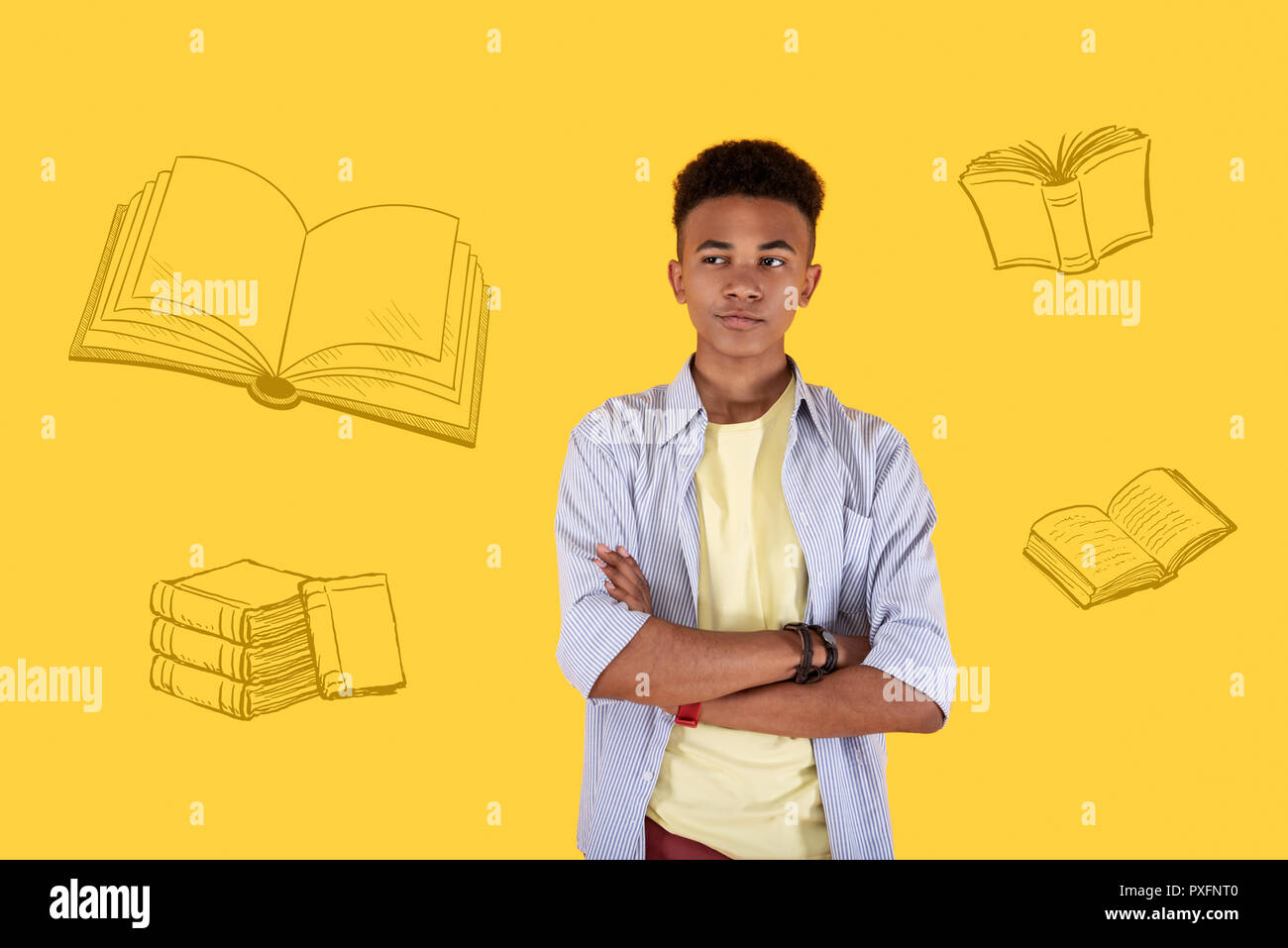 Boy reading a book standing up hi-res stock photography and images - Alamy