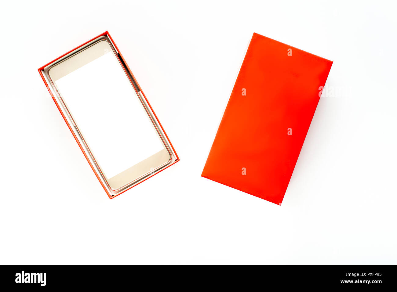 Isolated smart phone, gift box with smartphone with white screen and ...