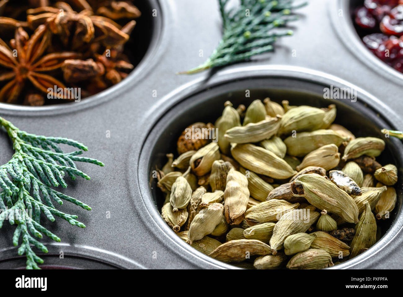 Christmas spices - dried cardamom seeds Stock Photo - Alamy
