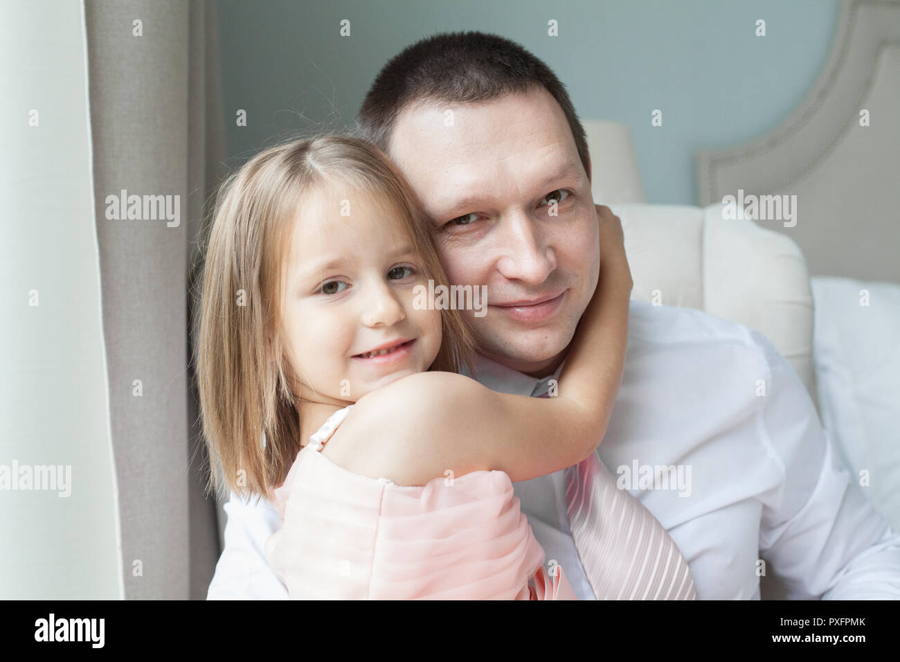 Girl hugging dad hi-res stock photography and images - Alamy
