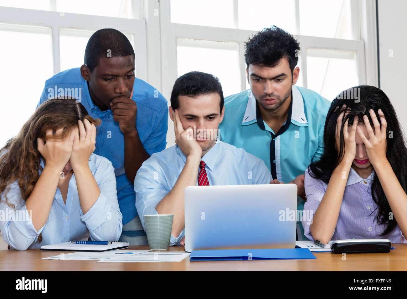 Employees of an insolvent startup company at office Stock Photo - Alamy