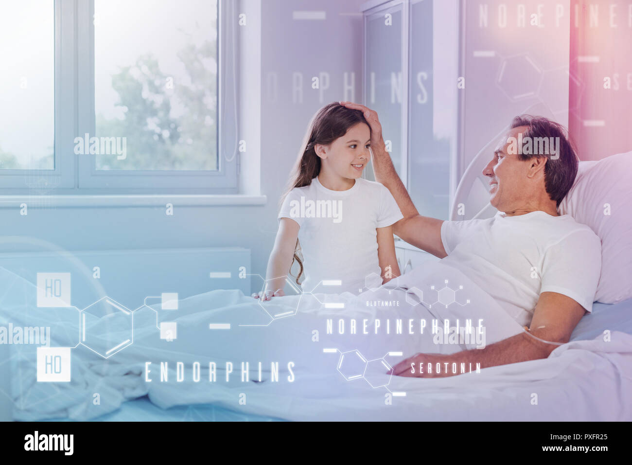 Little girl smiling while visiting her ill father in a hospital Stock ...
