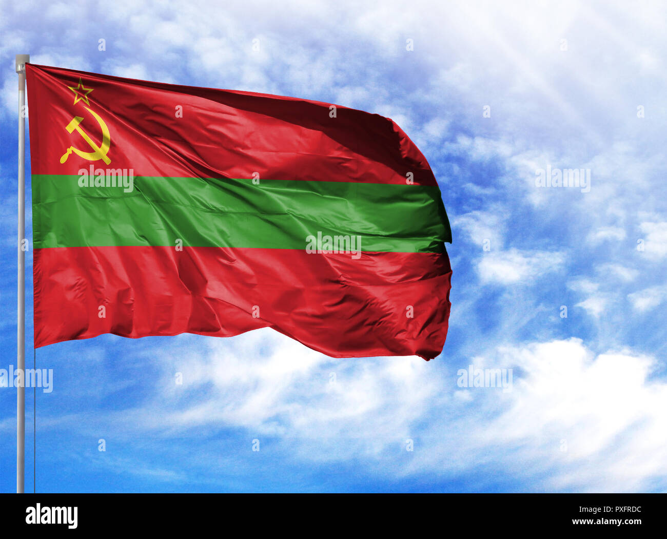 National flag of Transnistria on a flagpole in front of blue sky Stock ...