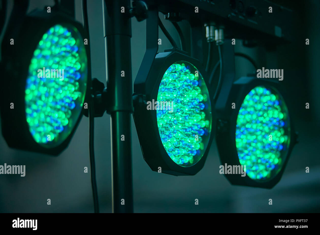 Detail of colored LED spotlights used to illuminate a stage stage of a ...