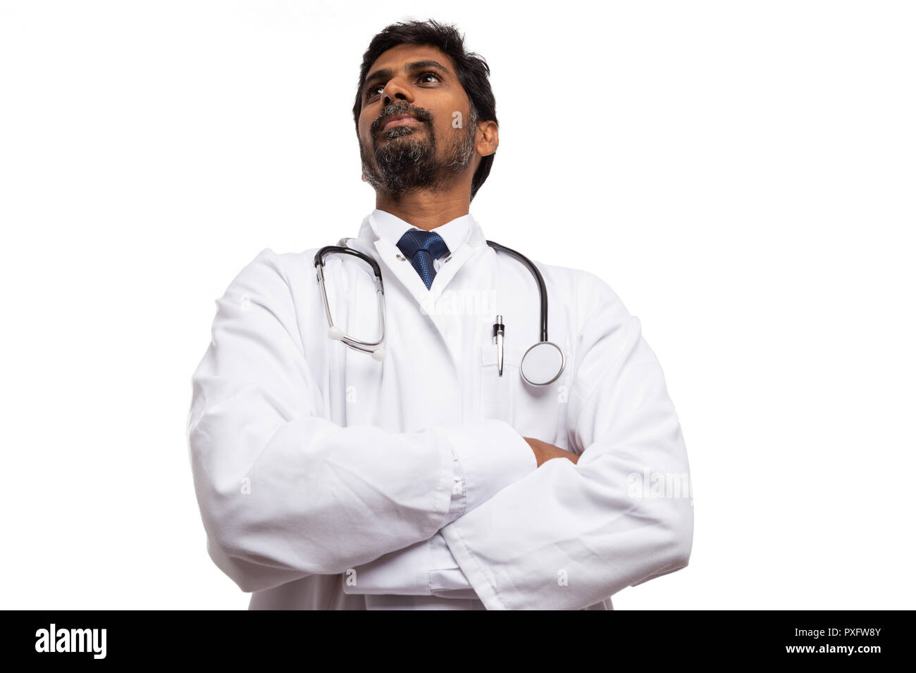 Low angle hero shot of proud and successful indian male doctor isolated ...