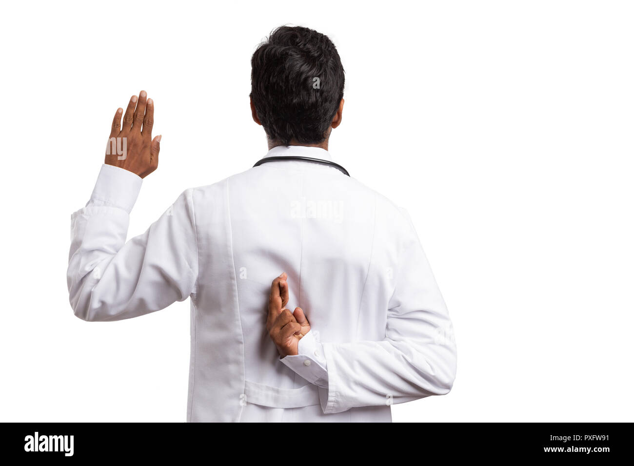 Fake oath made by indian doctor with fingers crossed behind back and ...