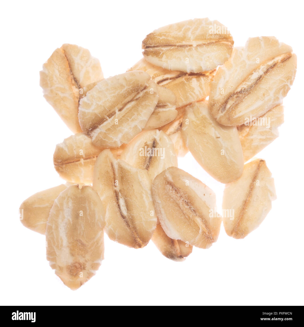 Oat flakes isolated on white background Stock Photo - Alamy