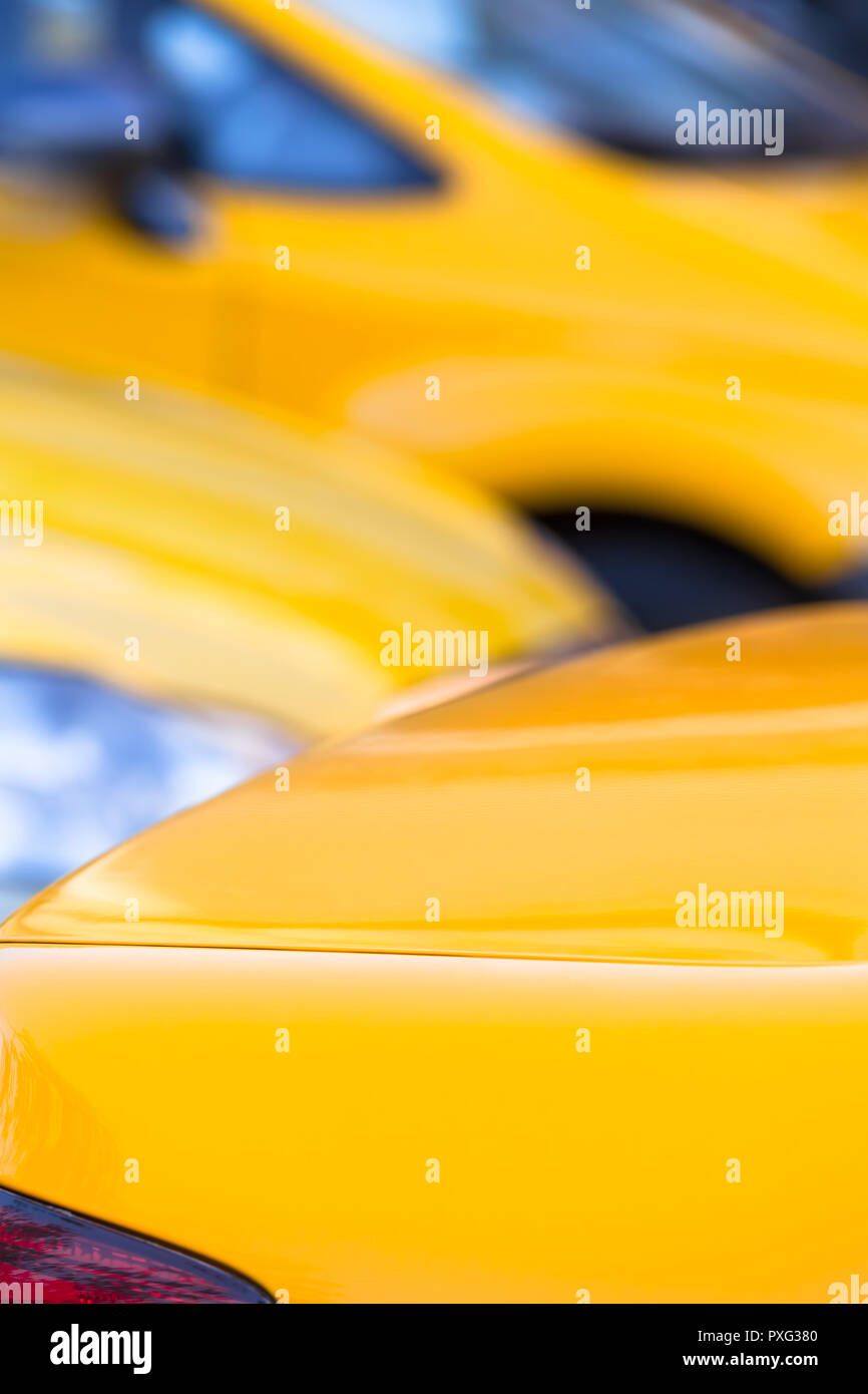 Vertical close up detail of yellow taxi cars background (copy space ...