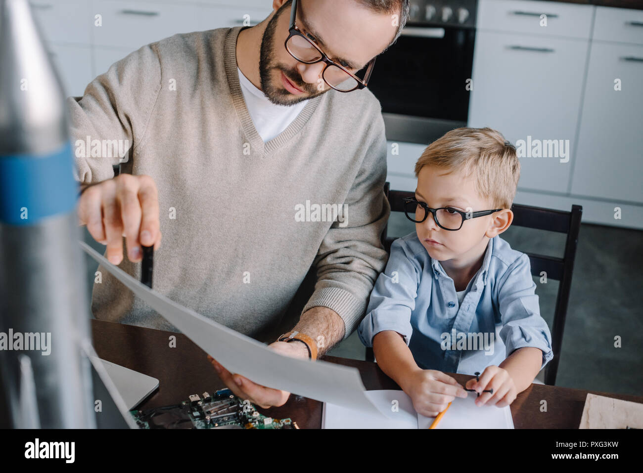Father boy model rocket hi-res stock photography and images - Alamy