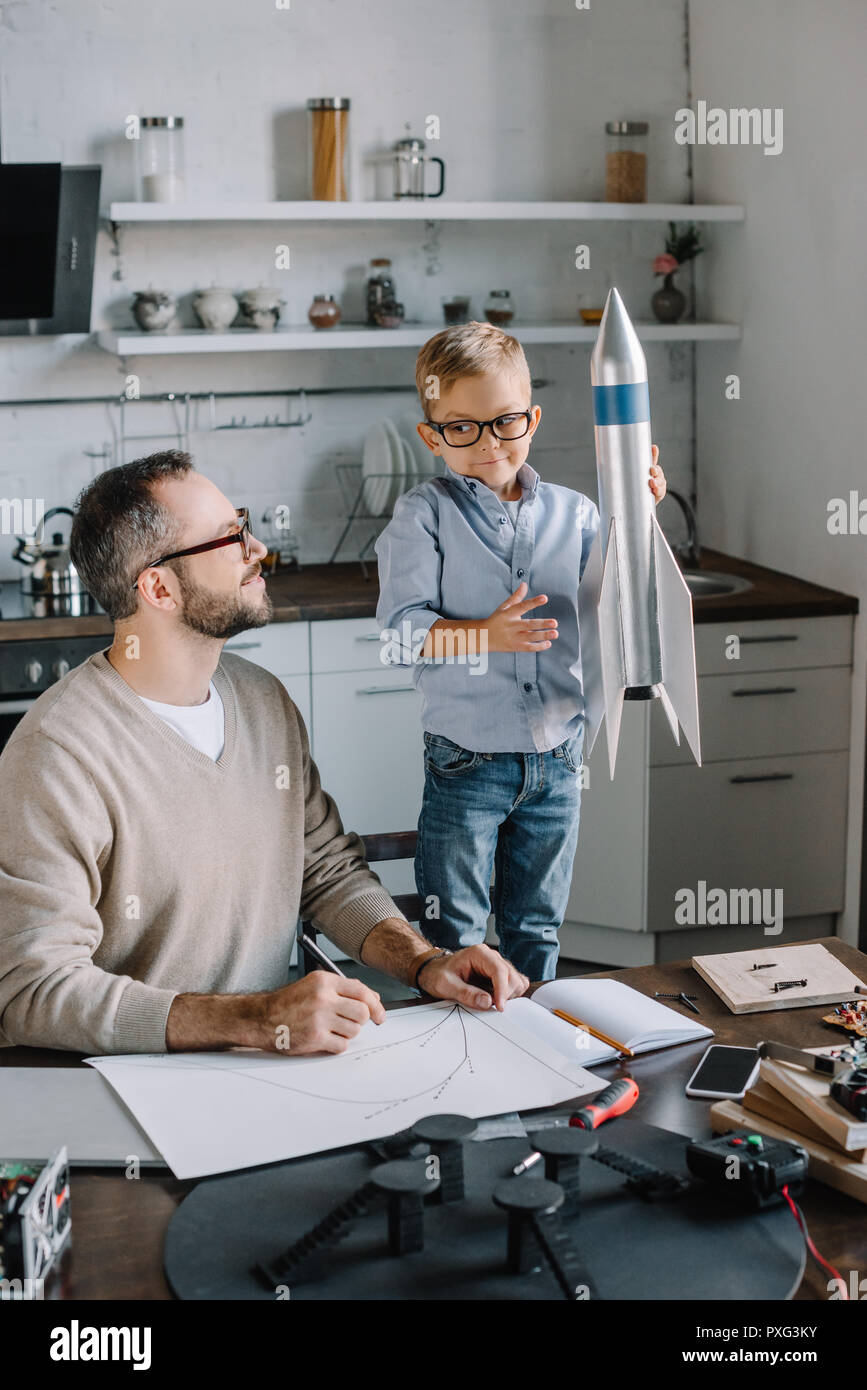 Father boy model rocket hi-res stock photography and images - Alamy