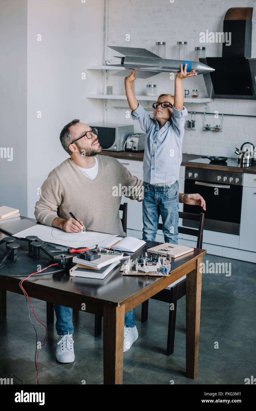 Father boy model rocket hi-res stock photography and images - Alamy