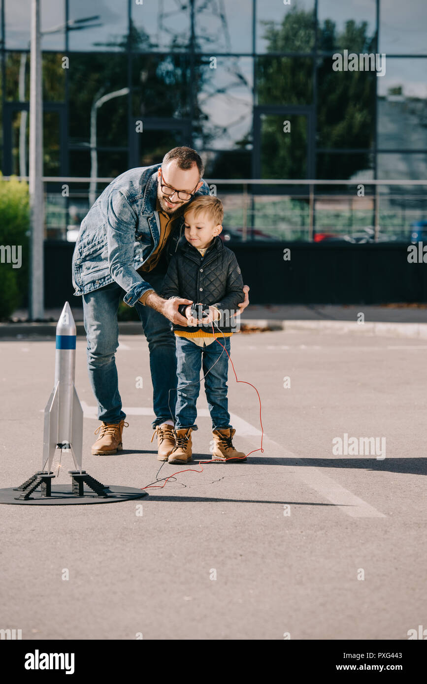 Father boy model rocket hi-res stock photography and images - Alamy
