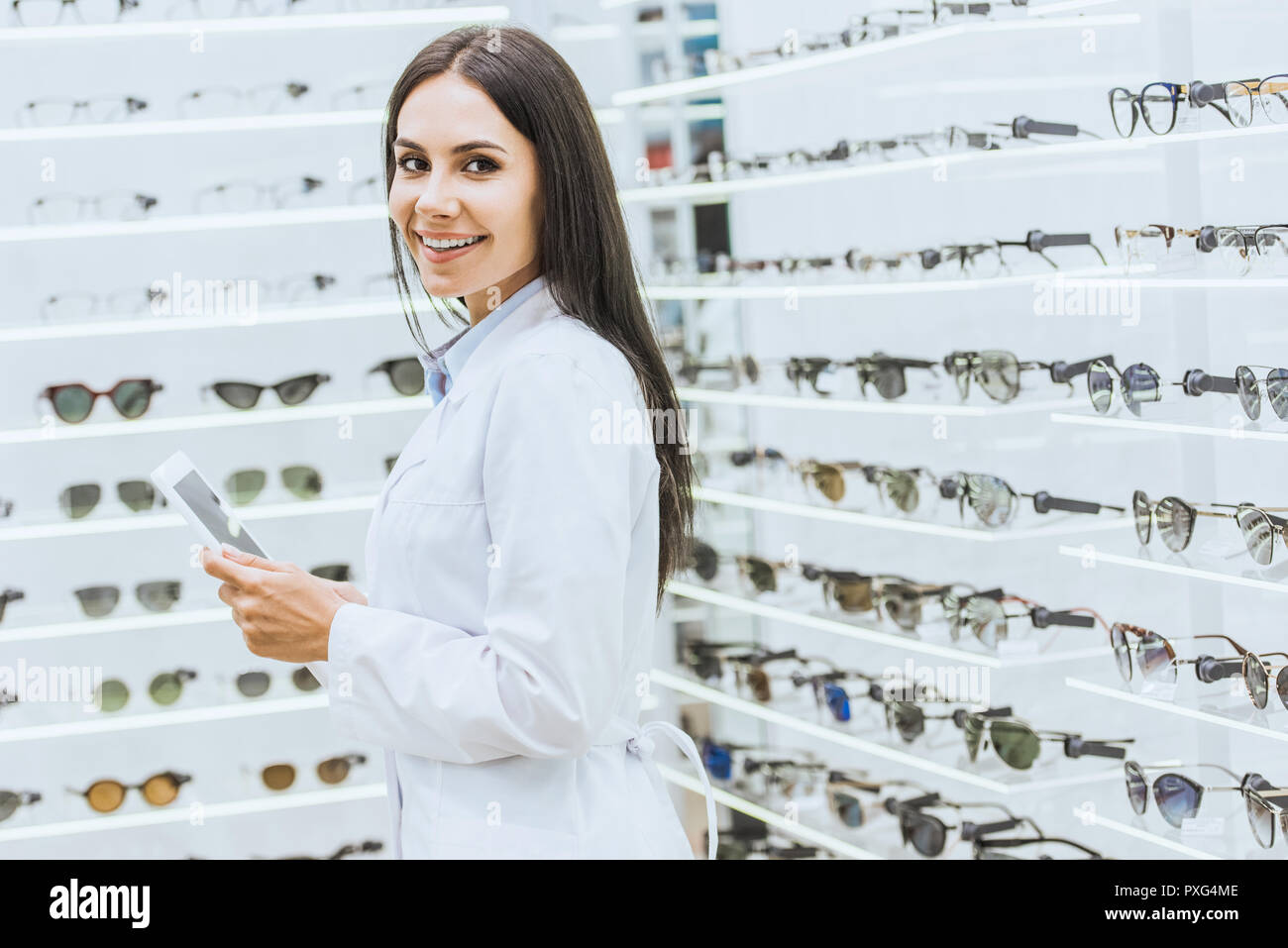 Attractive optician using digital hi-res stock photography and images - Alamy