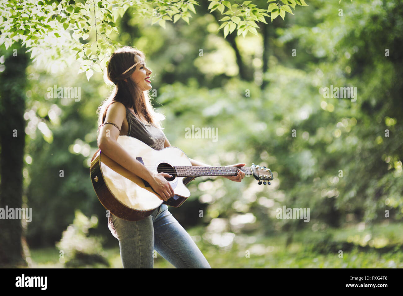 Guitar in nature hi-res stock photography and images - Alamy