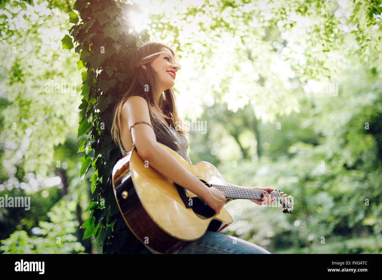 Guitar in nature hi-res stock photography and images - Alamy