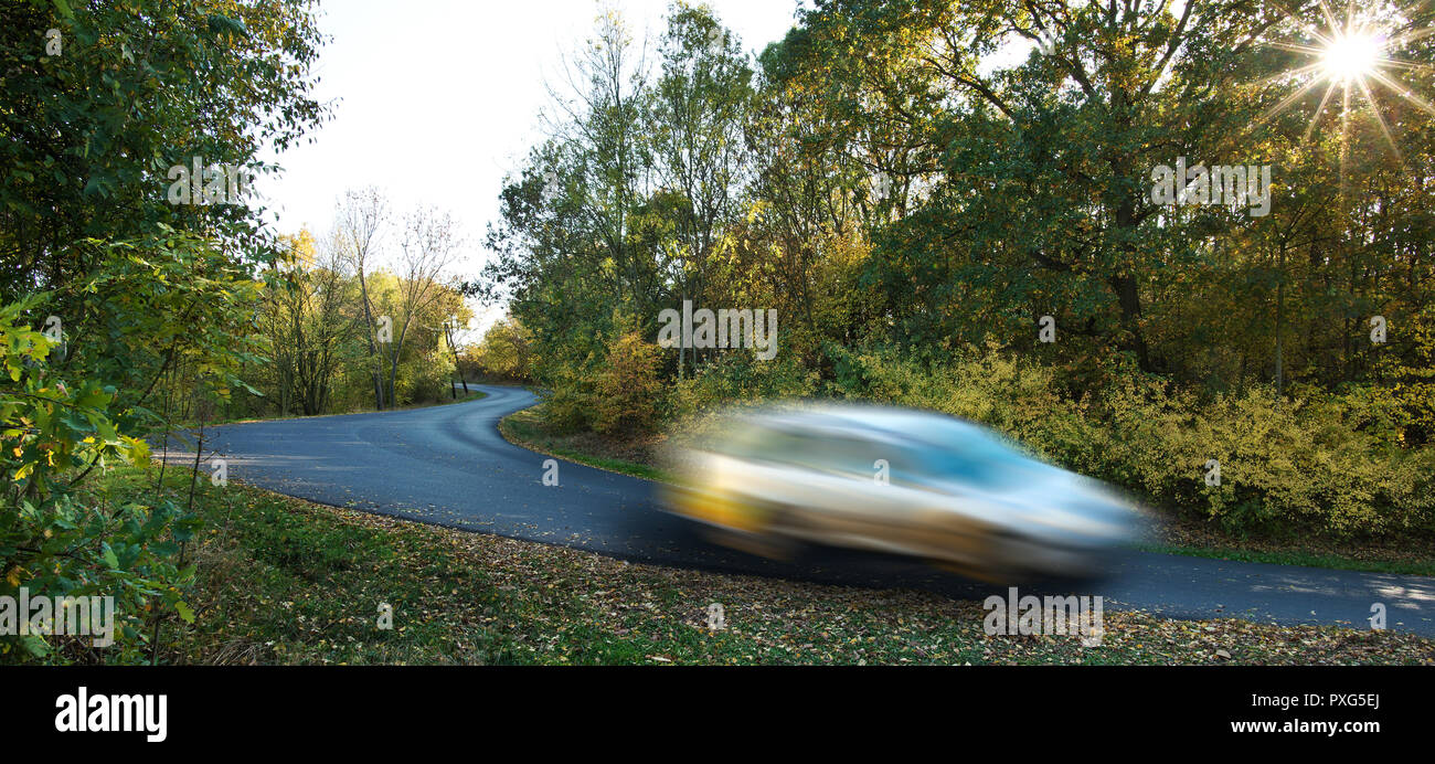 Car driving in a bend hi-res stock photography and images - Alamy