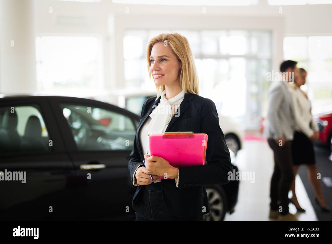 Portrait female car dealer in hi-res stock photography and images - Alamy