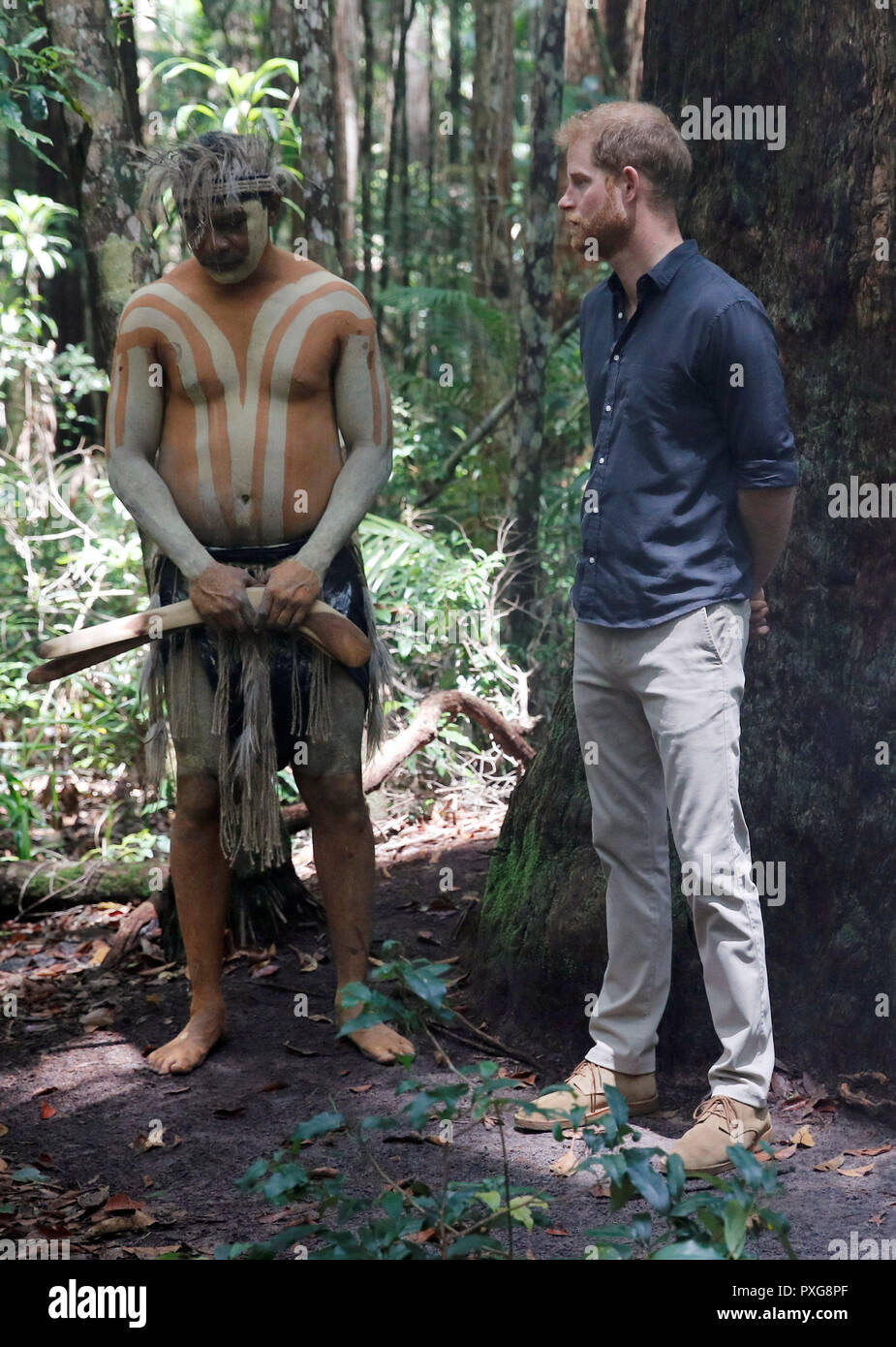 The Duke of Sussex stands next to Butchulla People during a dedication ...