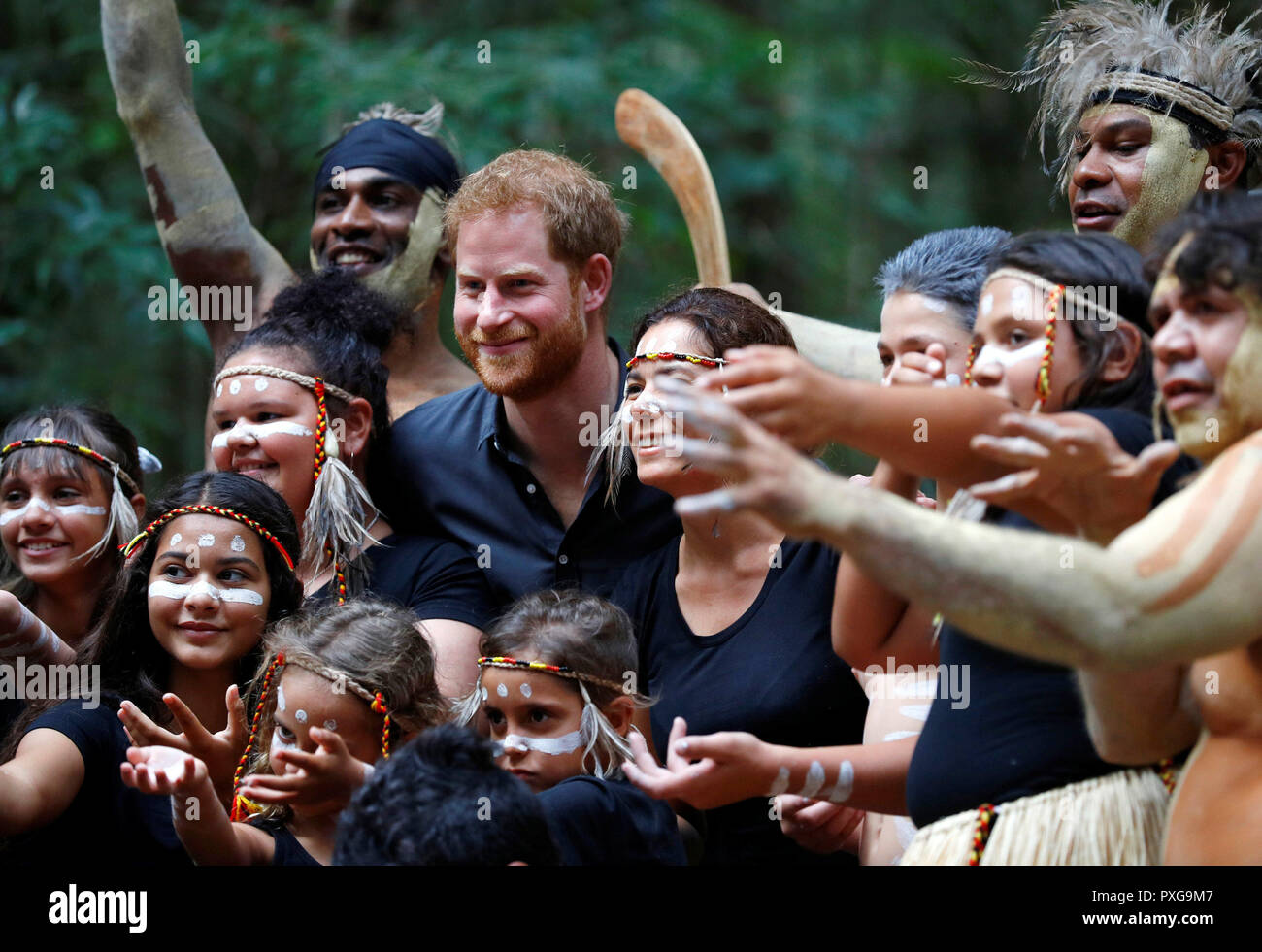 The Duke of Sussex poses for a photo with Butchulla People during a ...