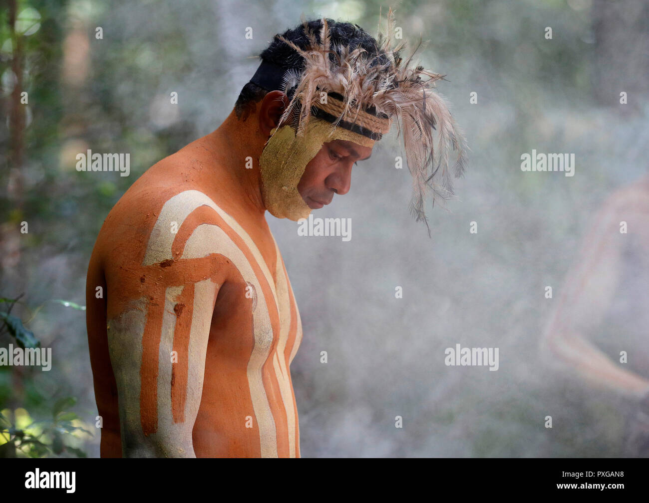 A member of the Butchulla People as the Duke of Sussex attends a ...
