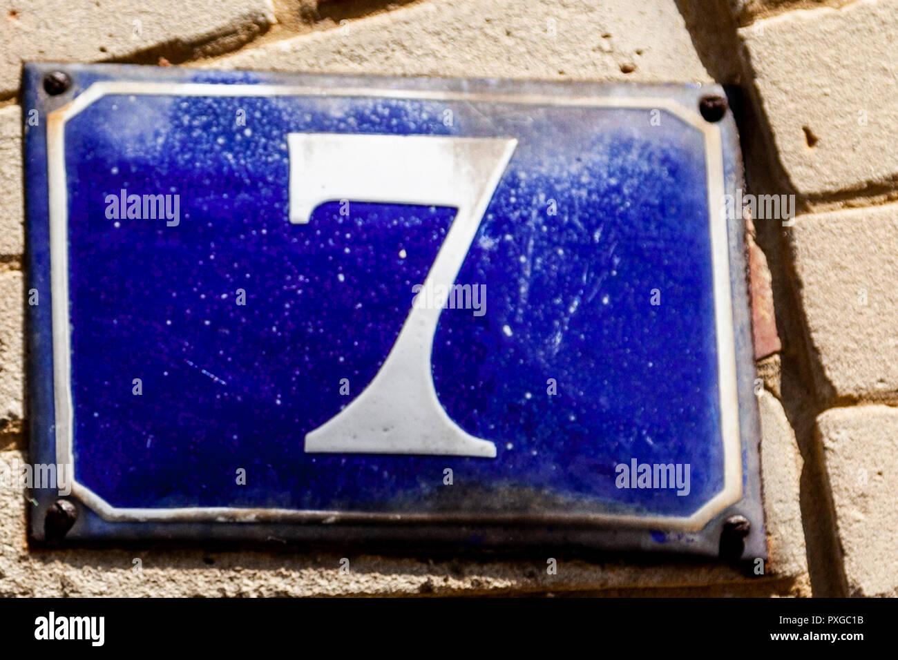Blue and white number plaques hi-res stock photography and images - Alamy