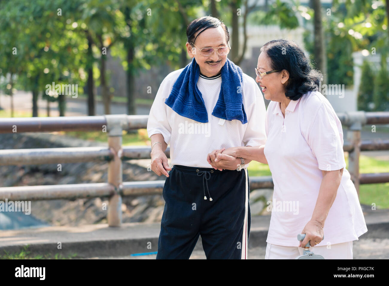 Old chinese man walking stick hi-res stock photography and images - Alamy