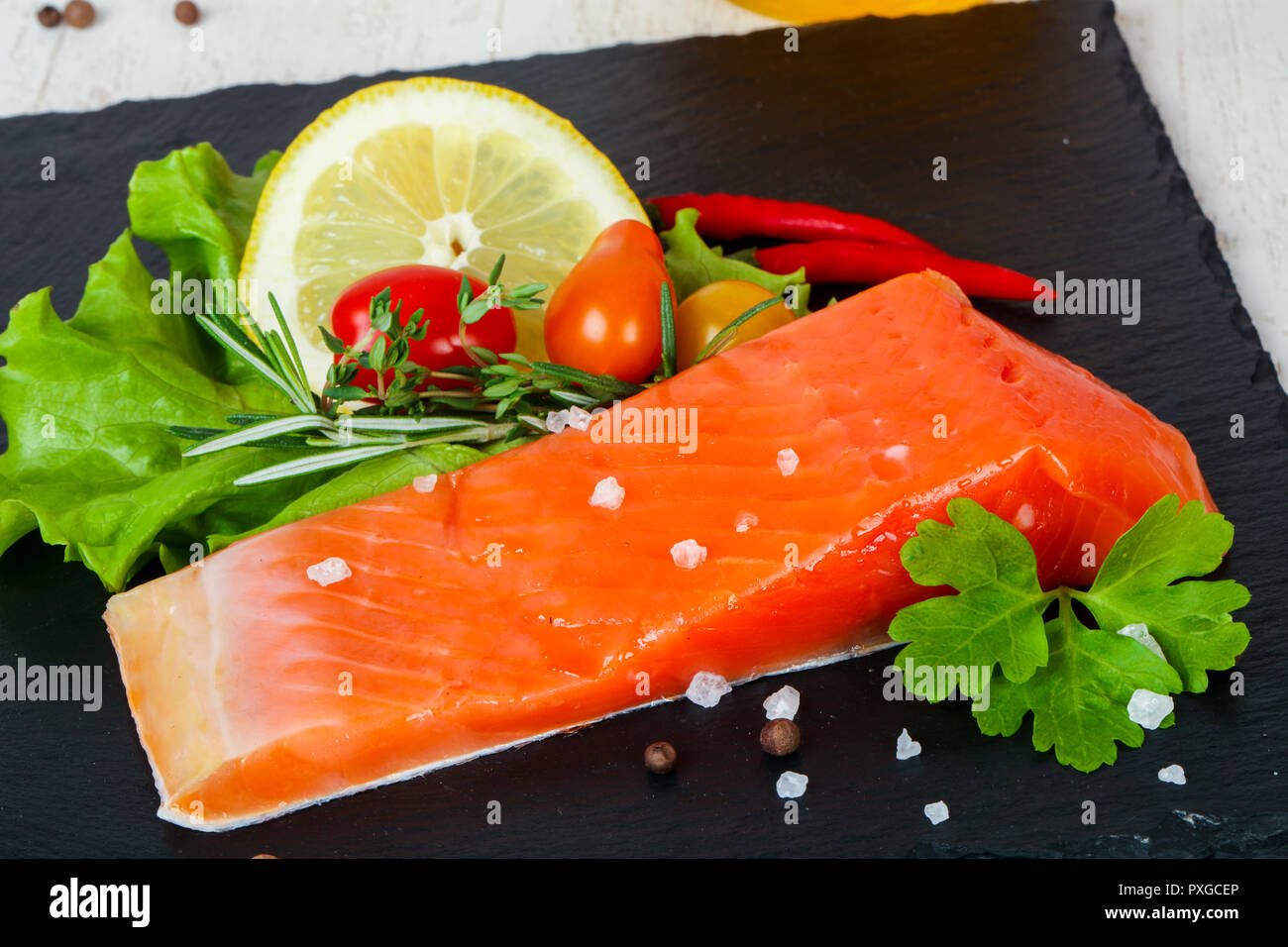 Raw trout fillet with salt and spices Stock Photo - Alamy