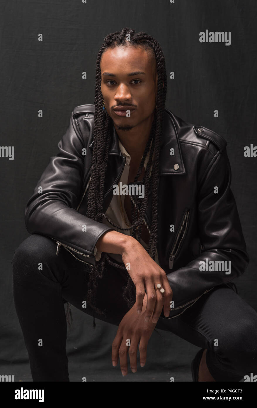 Fall fashion on black model Stock Photo - Alamy