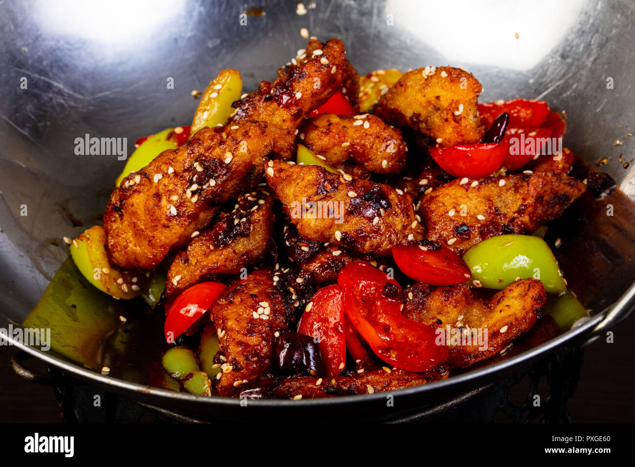 Asian cuisine - Fried entrails with pepper Stock Photo - Alamy