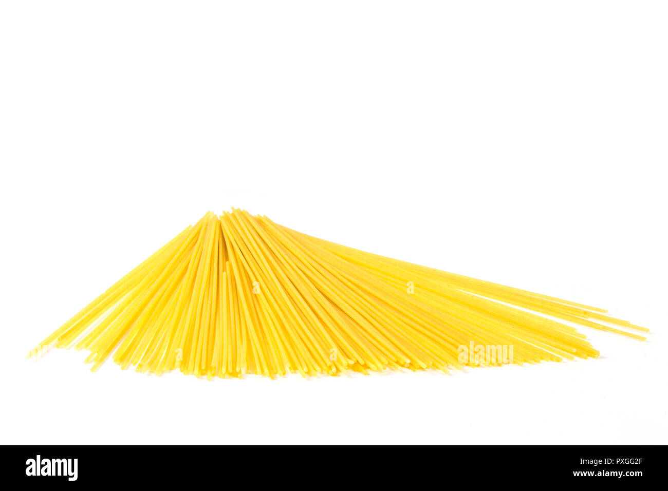 Raw dry green spaghetti Cut Out Stock Images & Pictures - Alamy