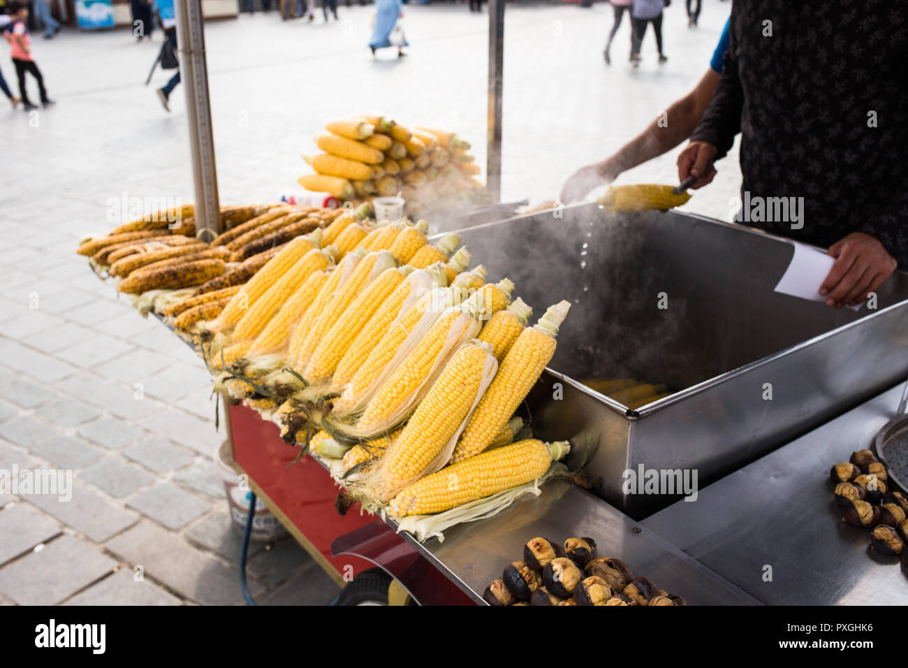 Fresh boiled and roasted corn is famous street food of Istanbul, Turkey ...
